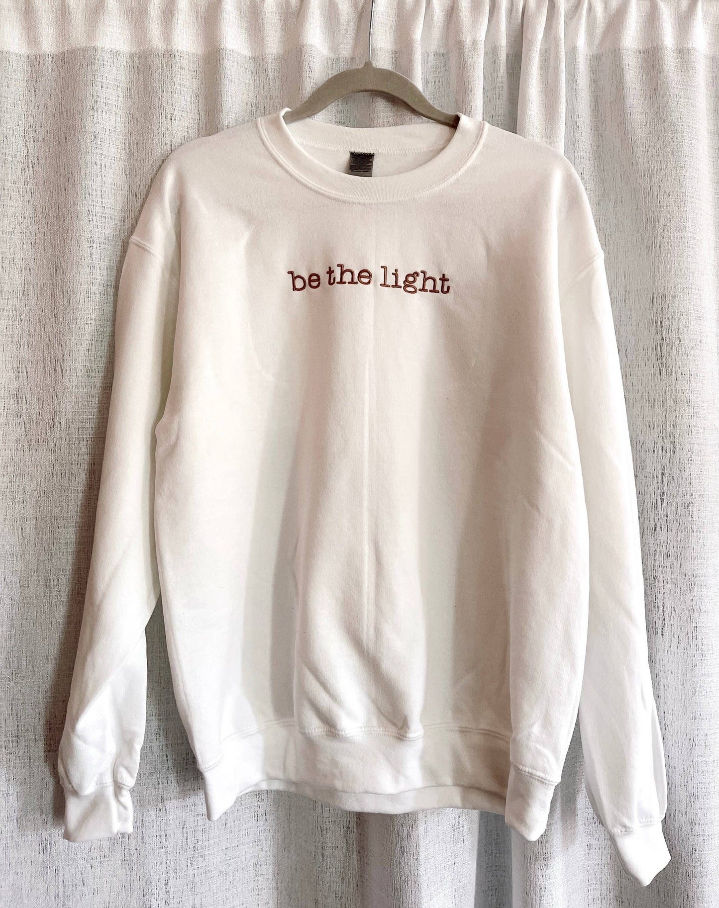 Embroidered ‘Be The Light’ Sweatshirt – 3:Sixteen Boutique